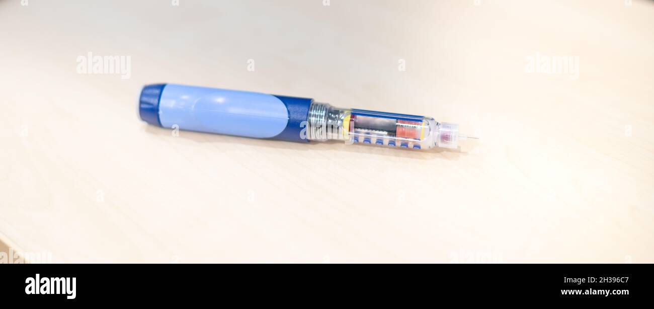Insulin pen with insulin drop at needle with the box, the equipment for ...