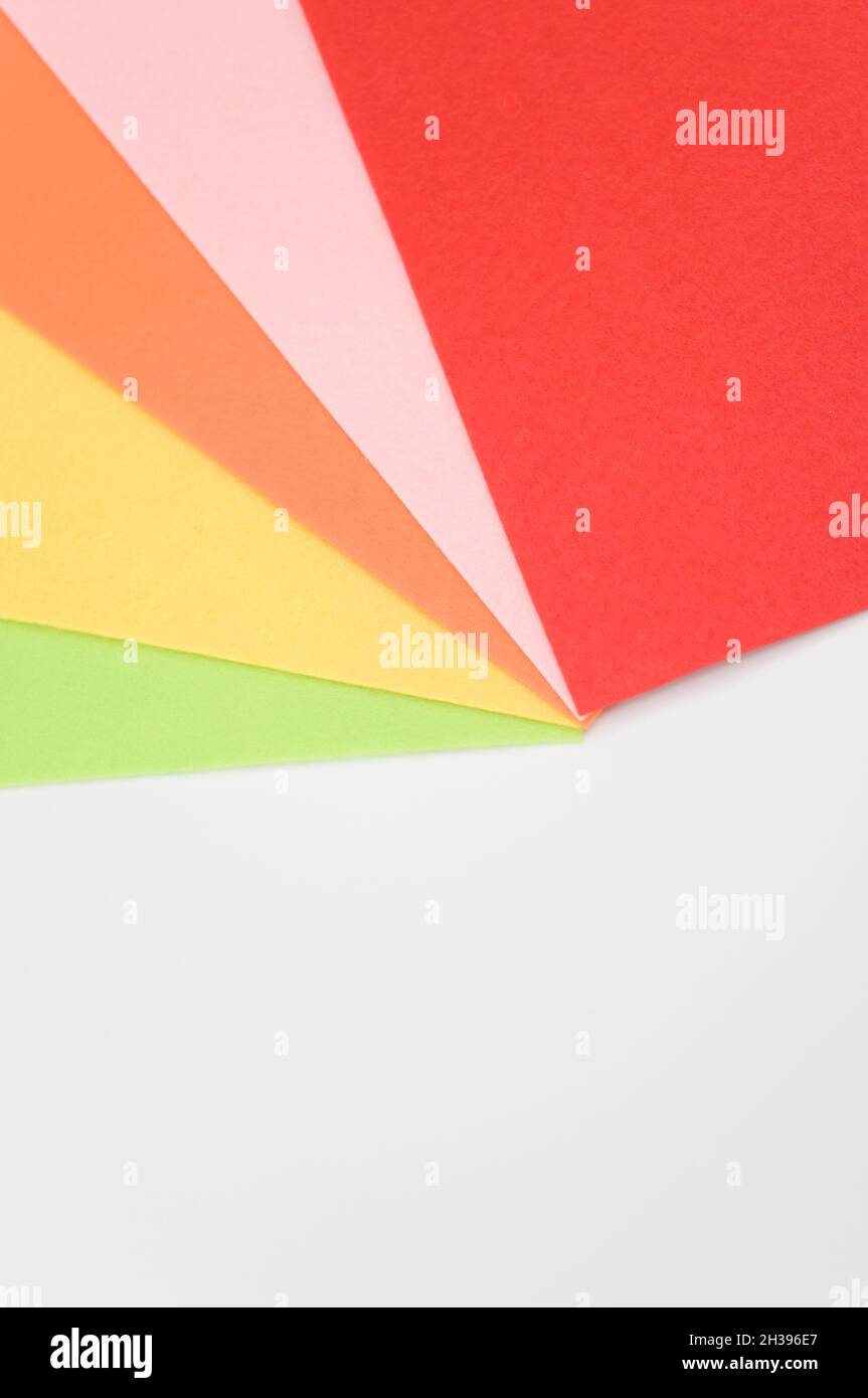 multicolored felt sheets backdrop on a white background Stock Photo - Alamy