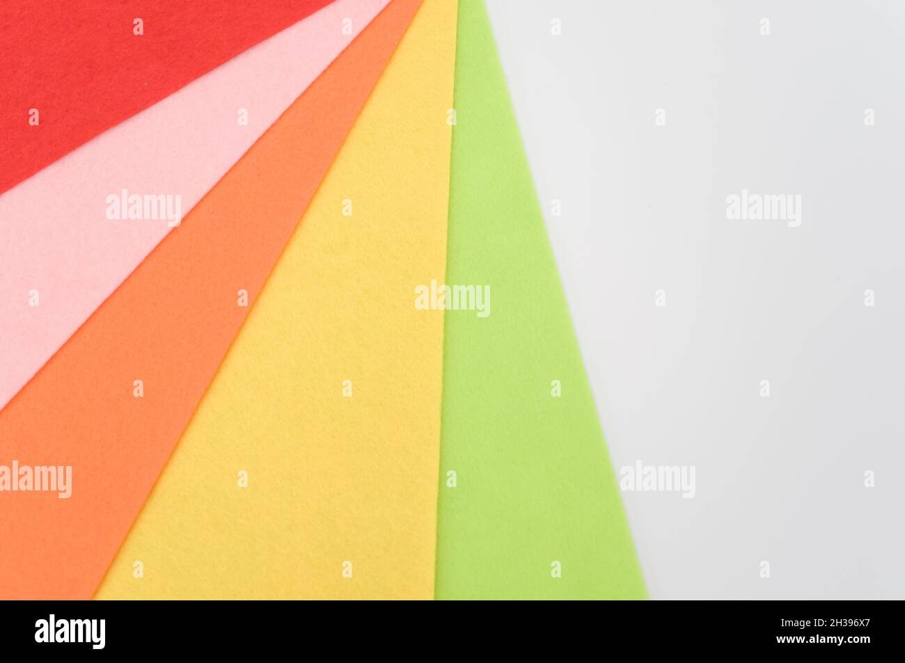 multicolored felt sheets backdrop with copy space Stock Photo - Alamy