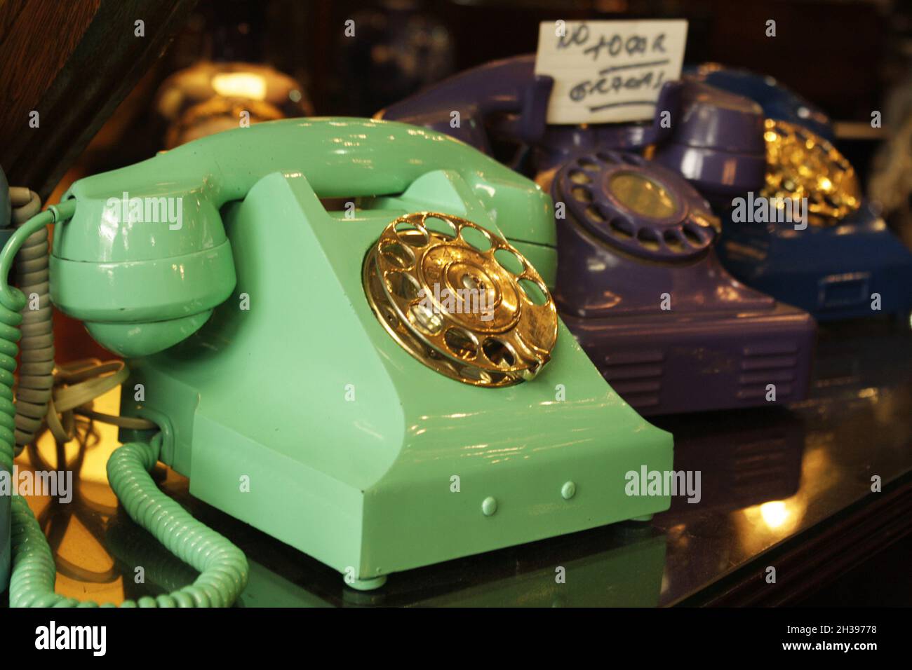 Three old phones of different colors Stock Photo - Alamy