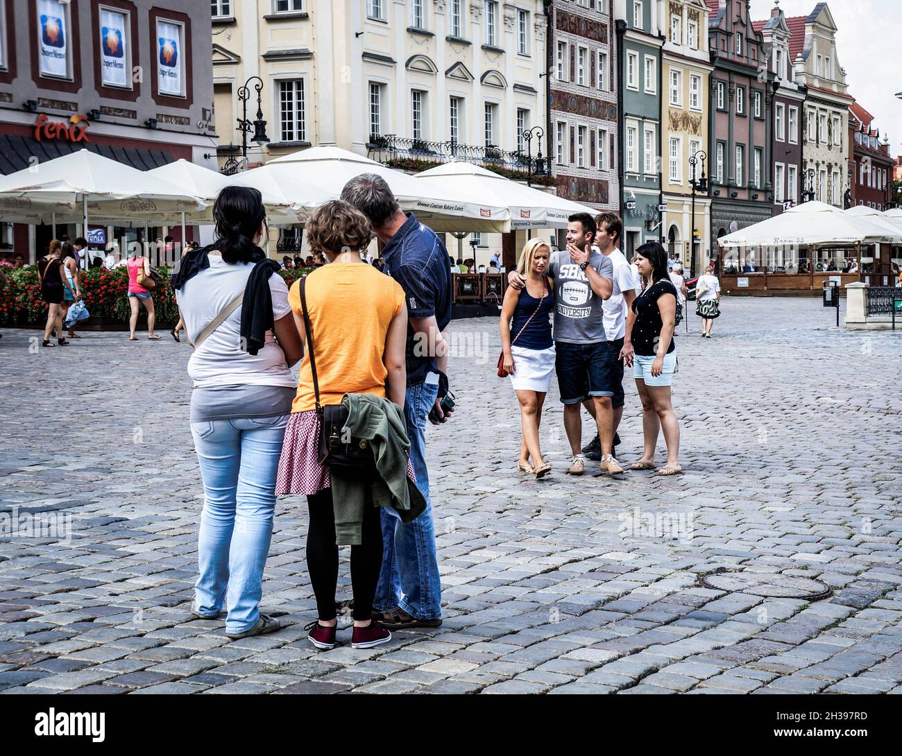 POZNAN, POLAND - Oct 13, 2016: A view of two small groups of people ...