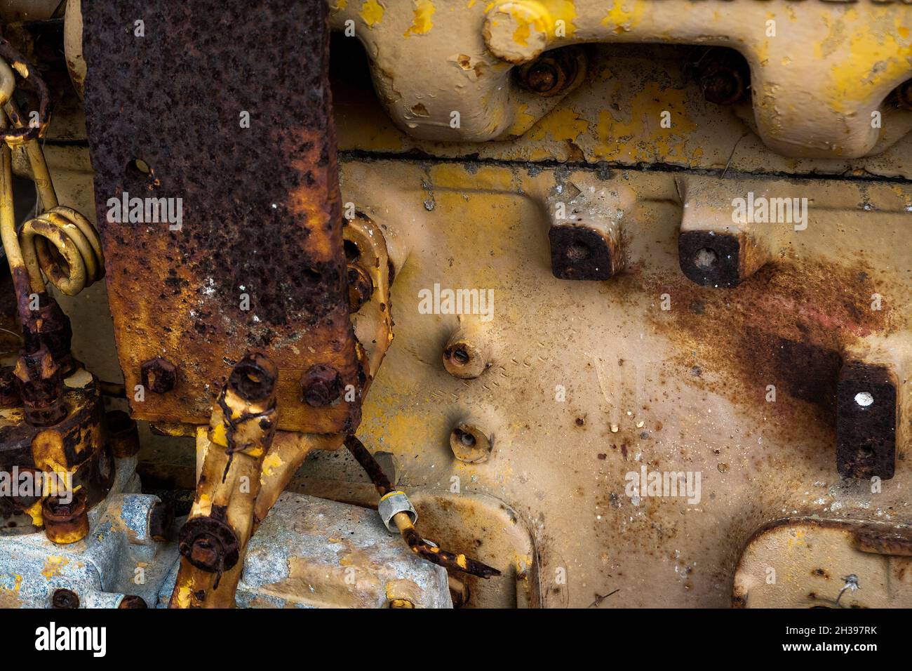 Close up of the side of an old pitted engine from a bygone era ...