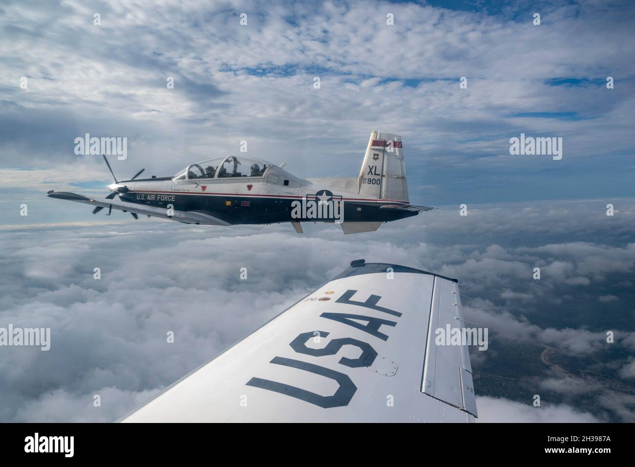A Texan II T-6 fly’s though the air as it performs standard training ...