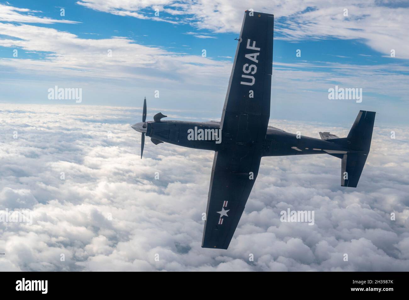 A Texan II T-6 fly’s though the air as it performs standard training ...