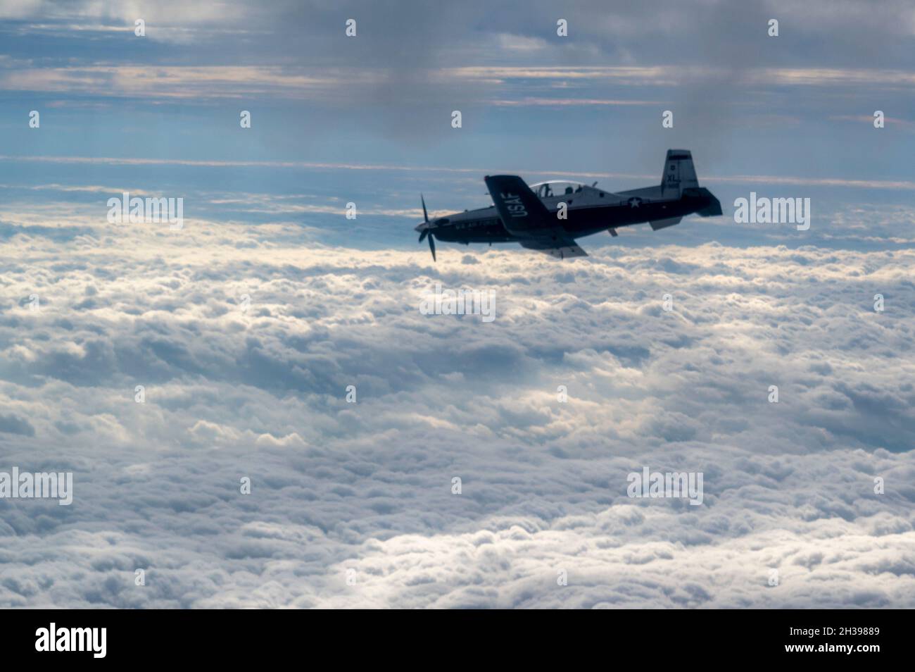 A Texan II T-6 fly’s though the air as it performs standard training ...