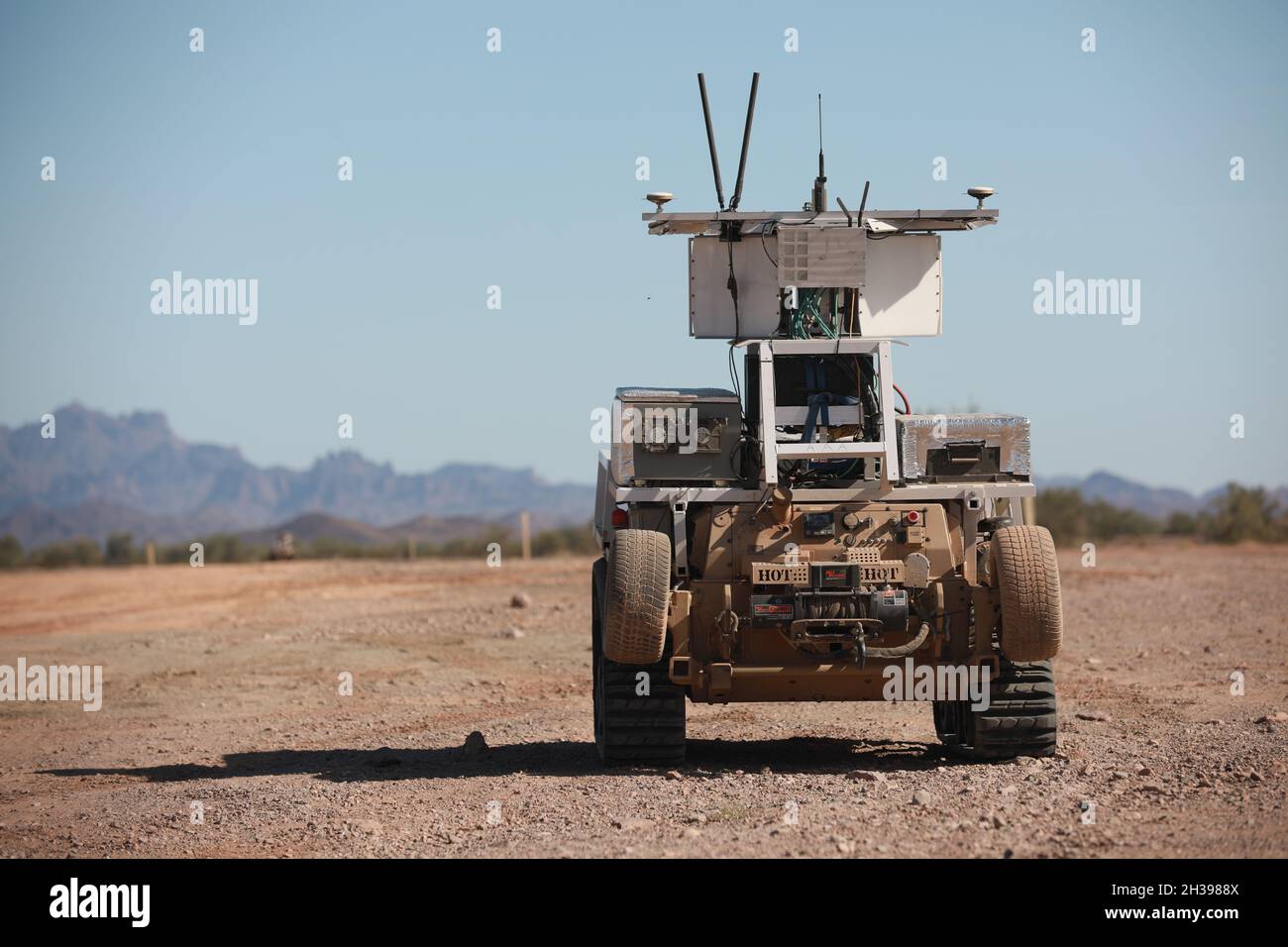 A Robotic Combat Vehicle navigates in the field during Project ...