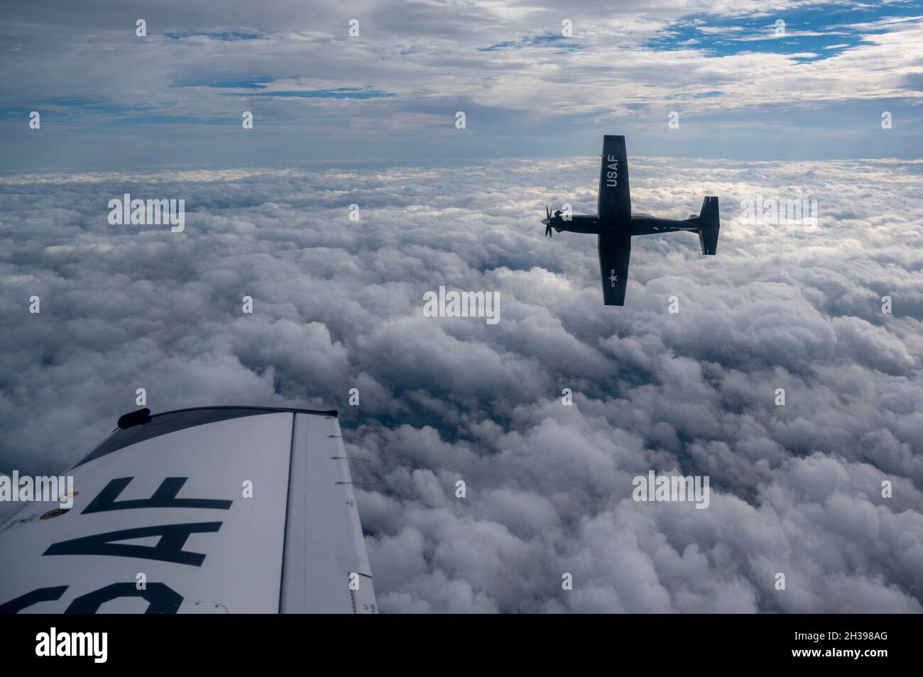 A Texan II T-6 fly’s though the air as it performs standard training ...