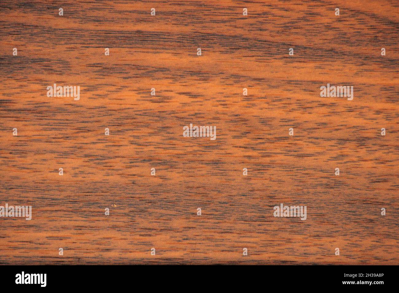 Dark cherry, a flat polished natural wood surface close-up. Background ...