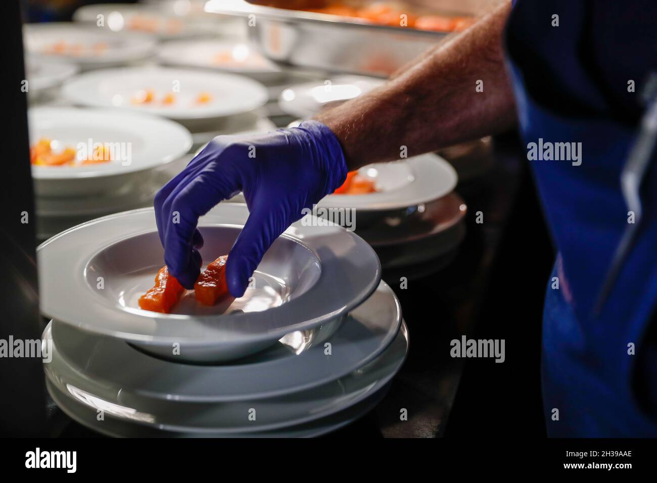 Berlin, Germany. 26th Oct, 2021. A chef prepares a dish at the ...