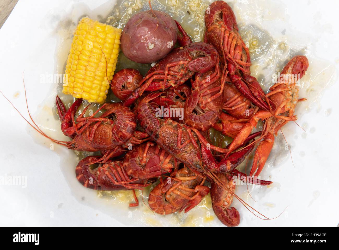 Boiled seasoned crawfish hi-res stock photography and images - Alamy