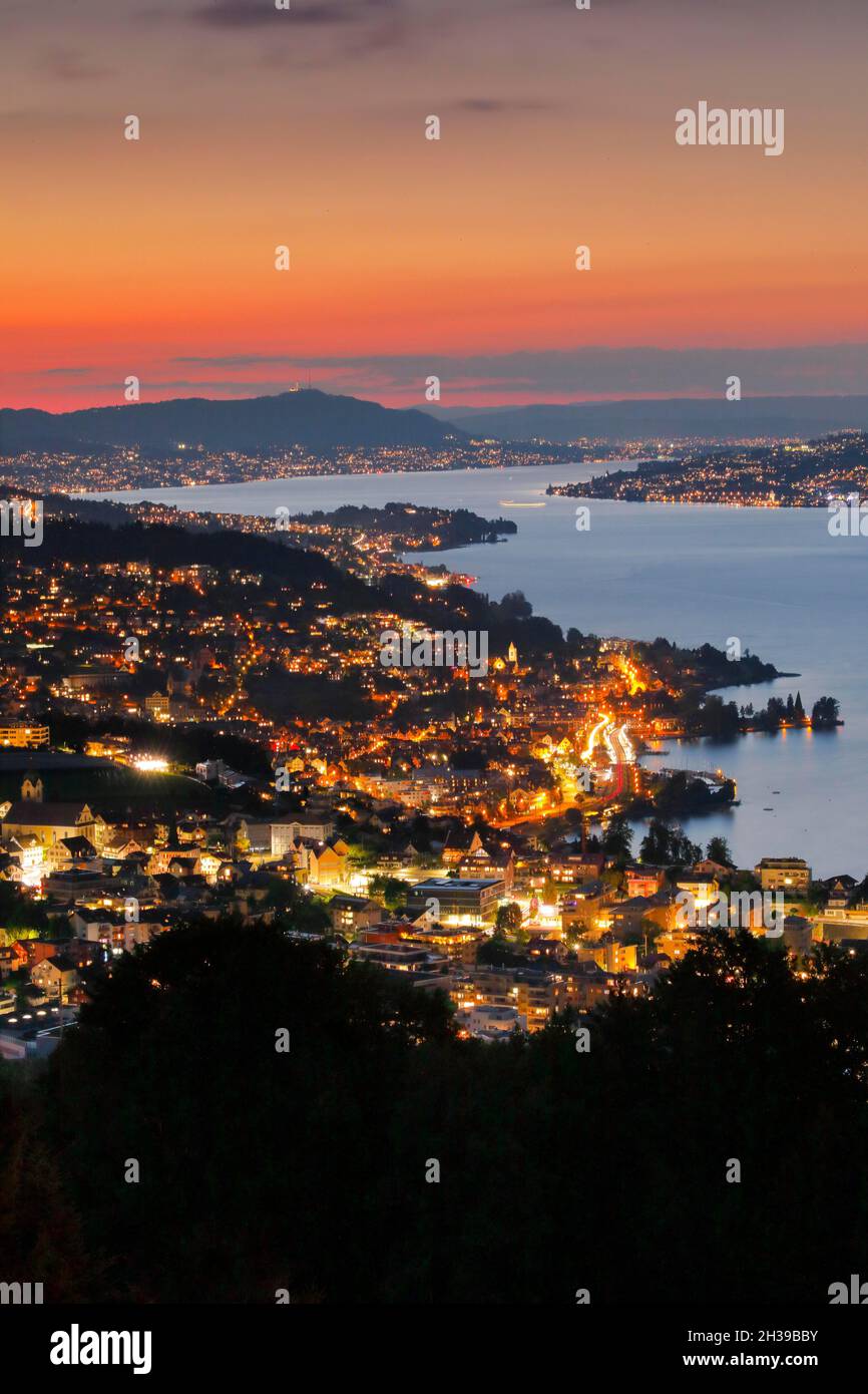 View at dusk from Feusisberg across Lake Zurich to Zurich, with the ...