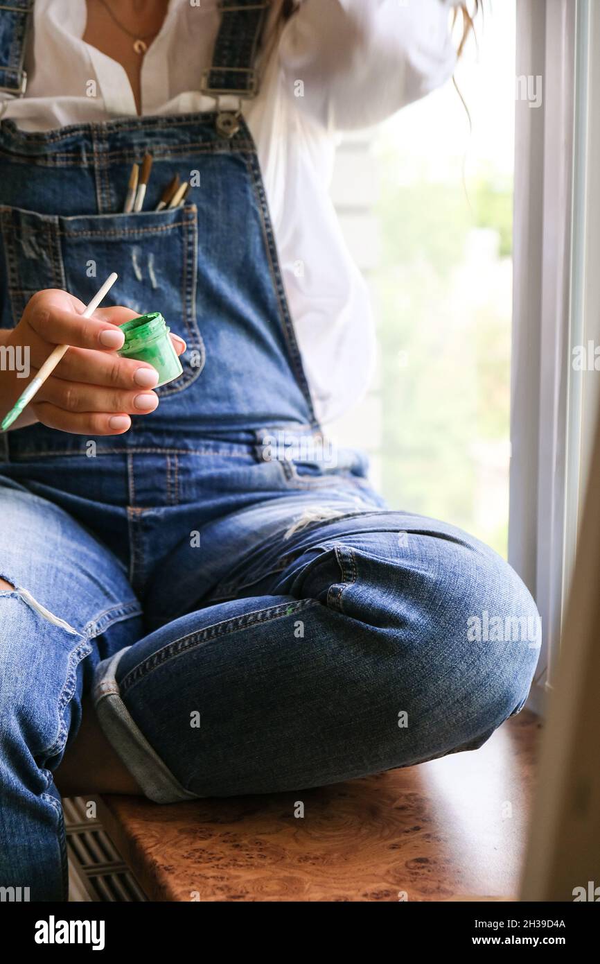 Creative painter in working process. Artist workplace, hobby, craft ...