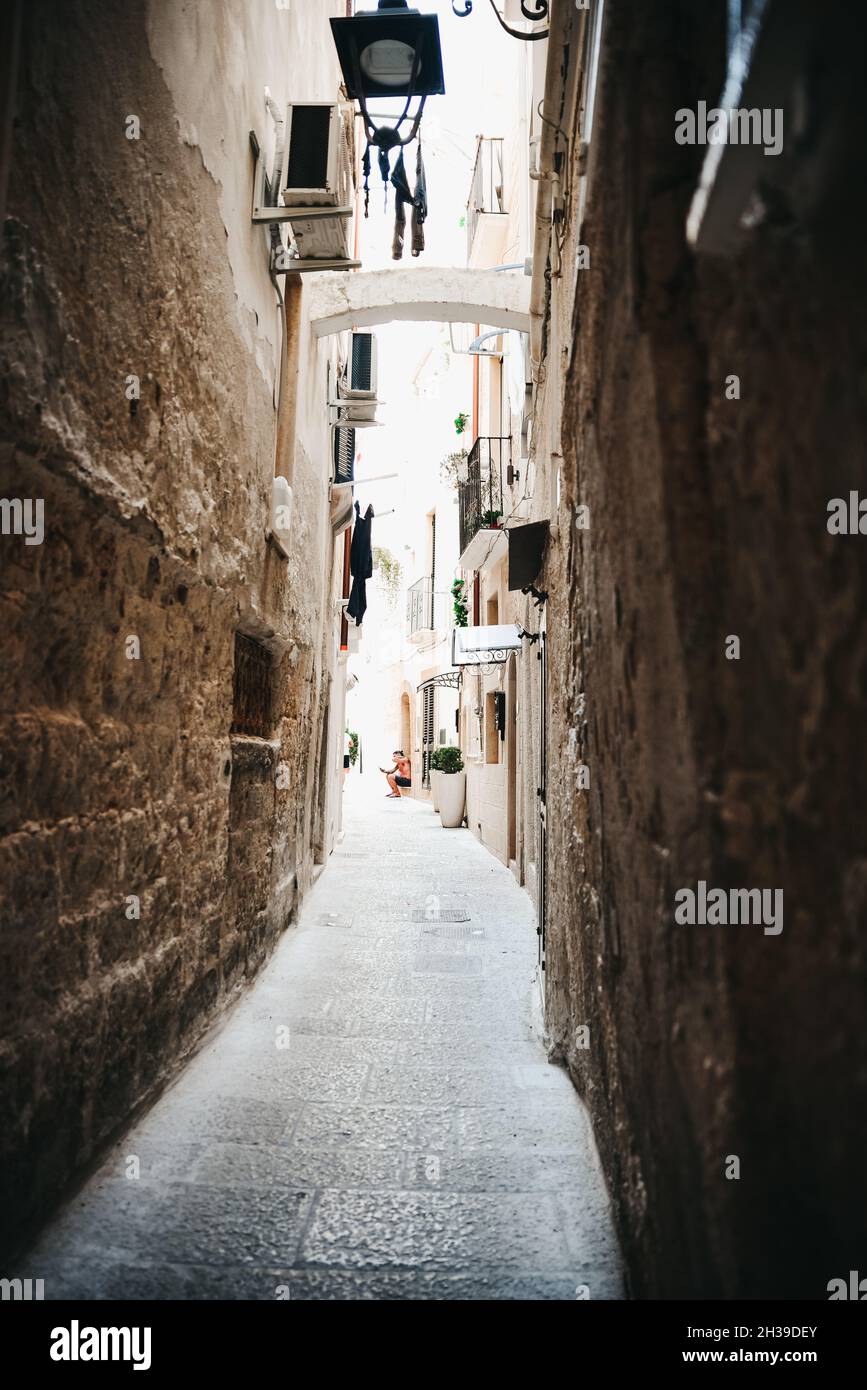 Narrow alley between old buildings Stock Photo - Alamy