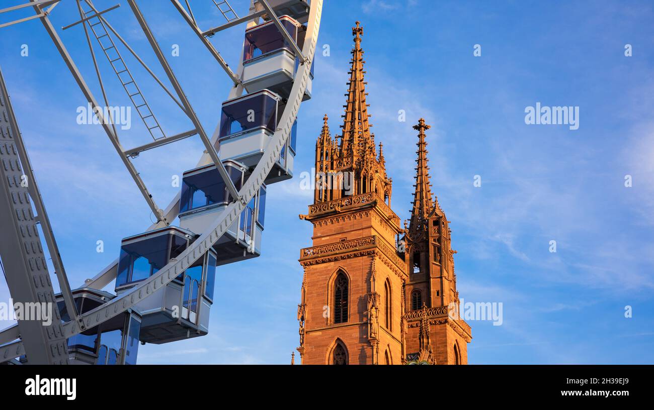 Münster Cathedrale with Ferris Wheel in Basel Stock Photo - Alamy