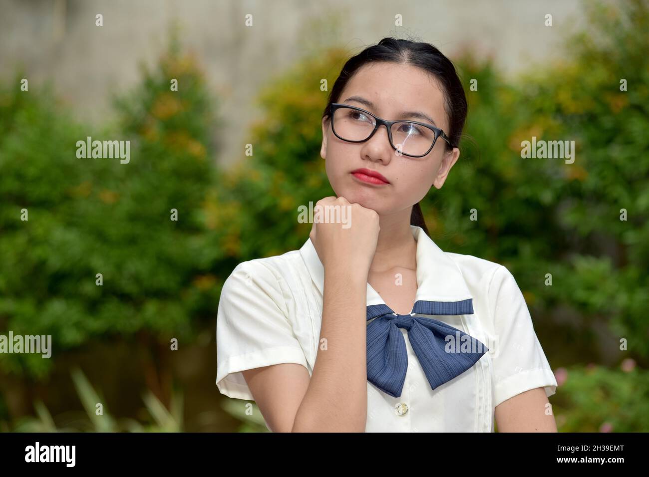 Smart Woman Making A Decision With Glasses Stock Photo - Alamy