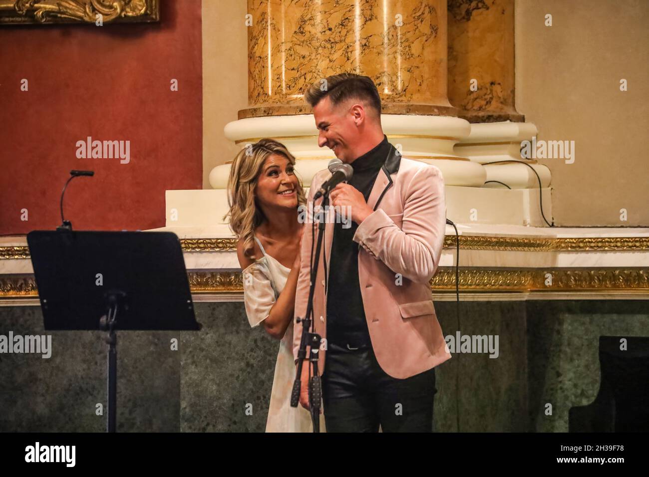 Gemma Oaten (left) and Matt Evers (right) are seen on stage during the ...