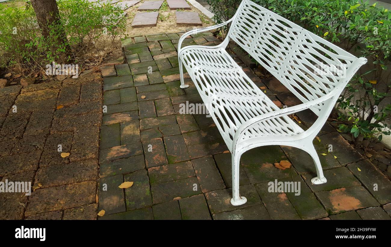 Steel White chair in the Park use for background Stock Photo - Alamy