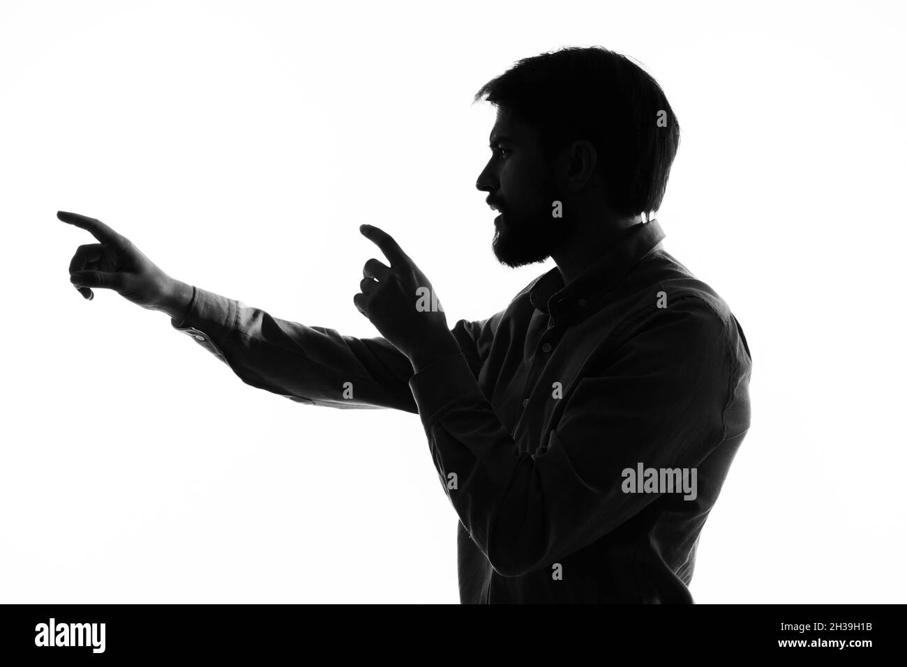 Man with a pistol in hand crime hand gesture posing studio Stock Photo ...
