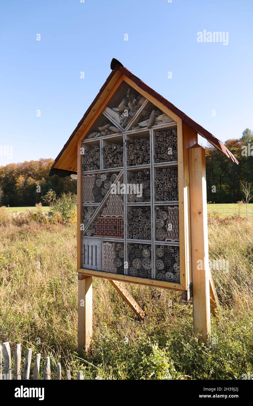 a large insect hotel in a meadow Stock Photo - Alamy
