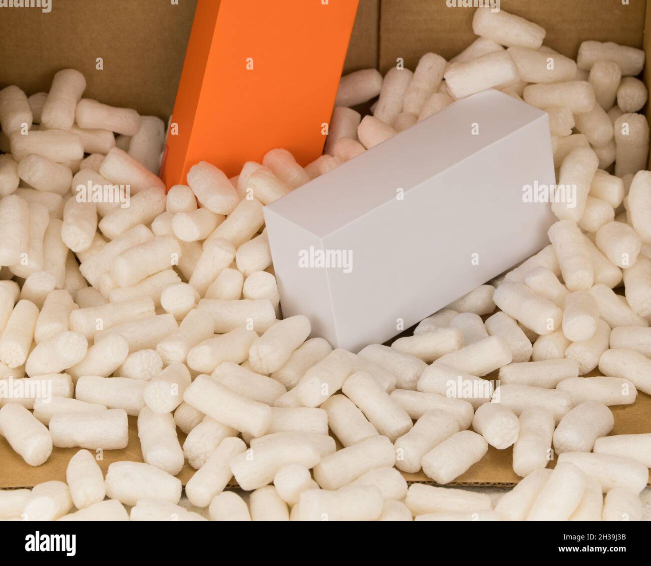 Cardboard box with styrofoam filler for safe packaging. Gift package ...