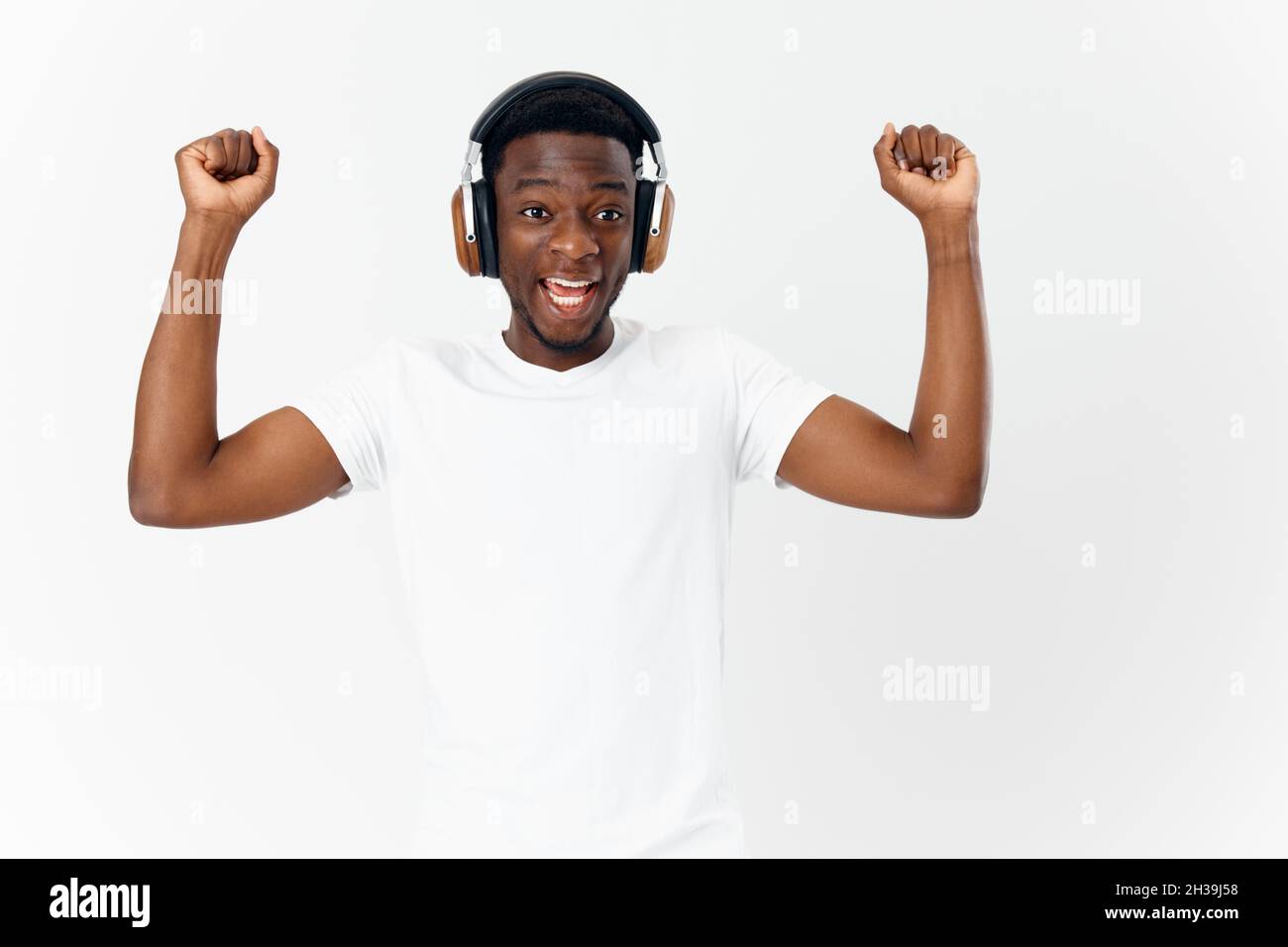african man wearing headphones music fun technology Stock Photo - Alamy