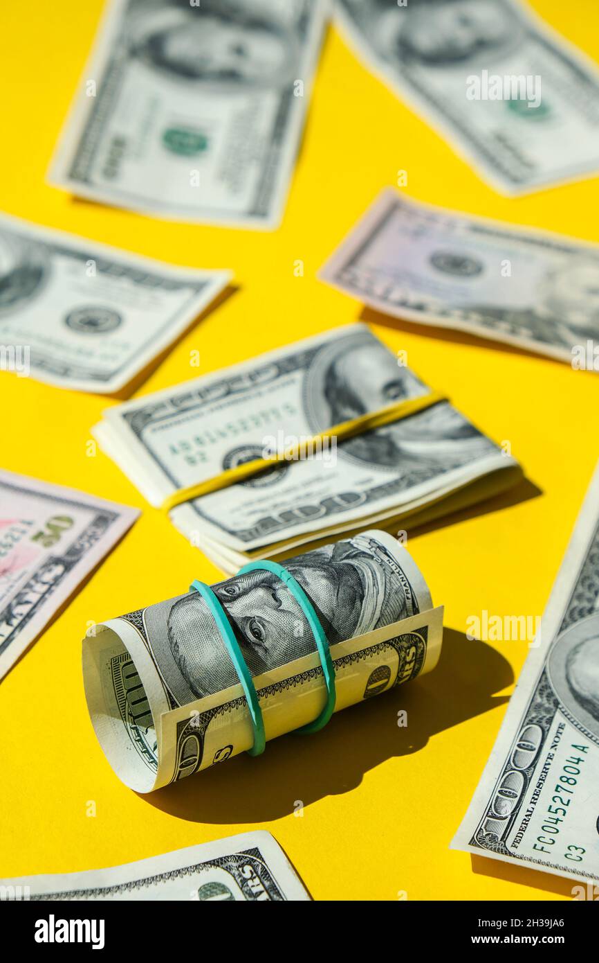 US dollars bundle close up isolated on dollar background. Paper ...