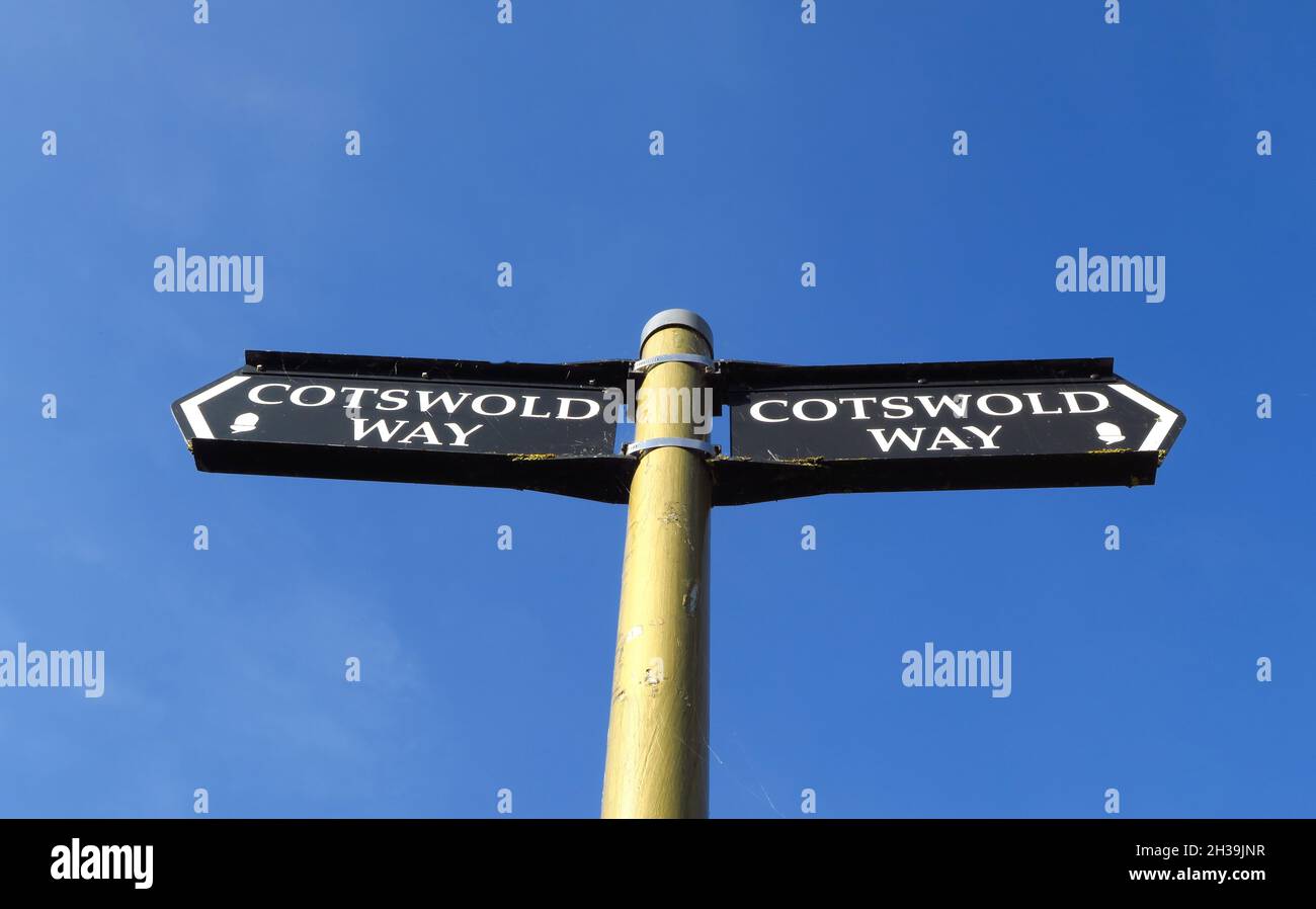 Cotswold Way signpost points out the direction of the route which runs ...
