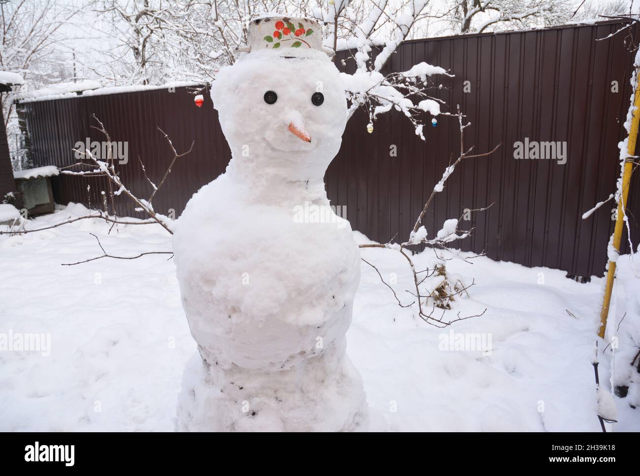 Snowman in hat hi-res stock photography and images - Alamy
