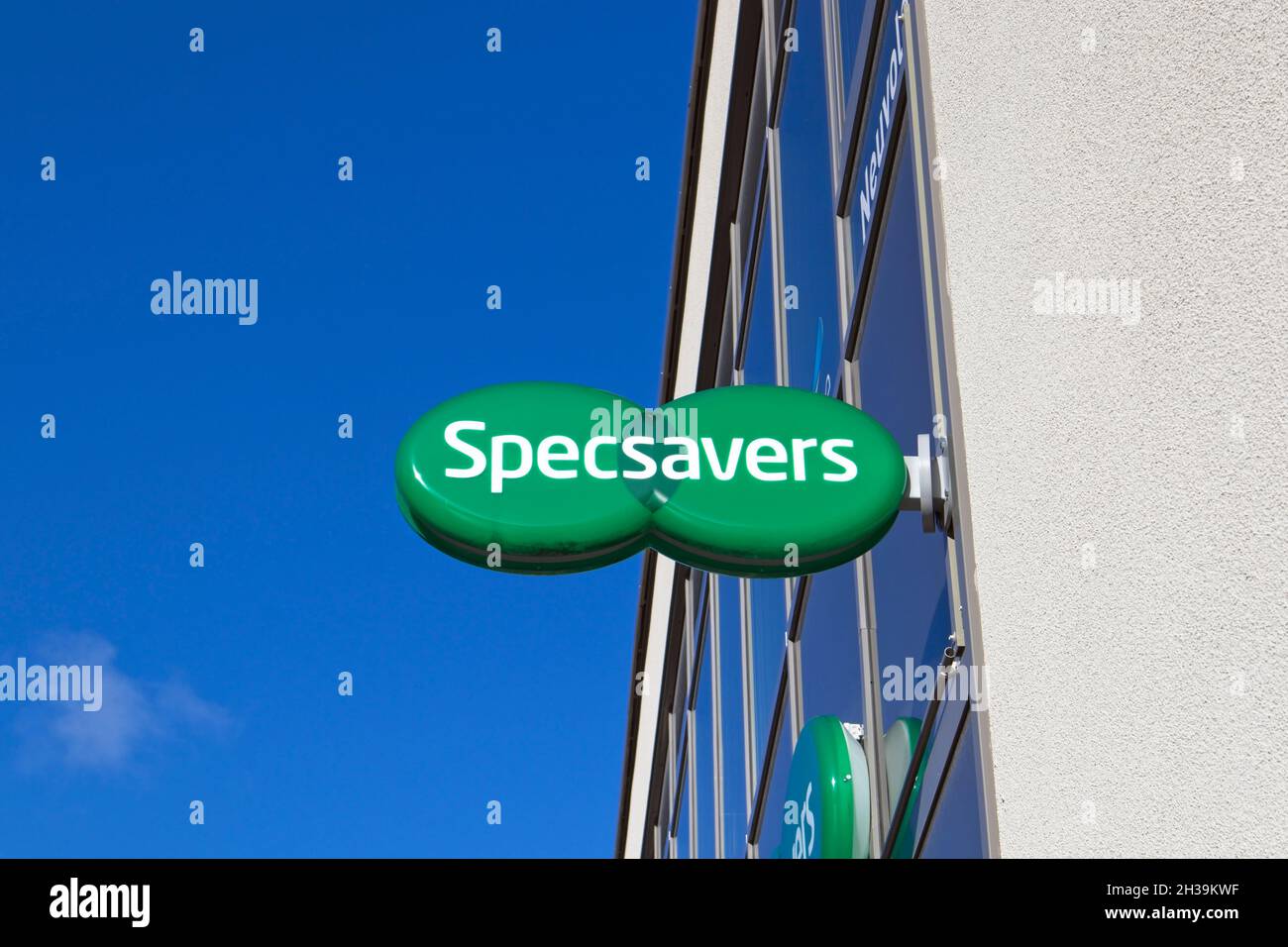 The Specsavers sign on the building wall Stock Photo - Alamy