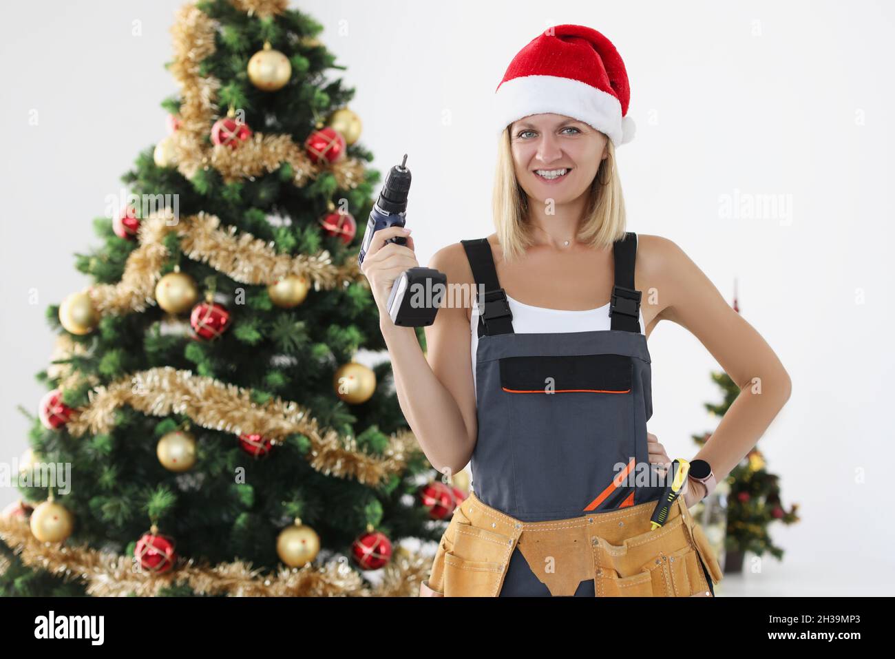 Female handyman drill hi-res stock photography and images - Alamy