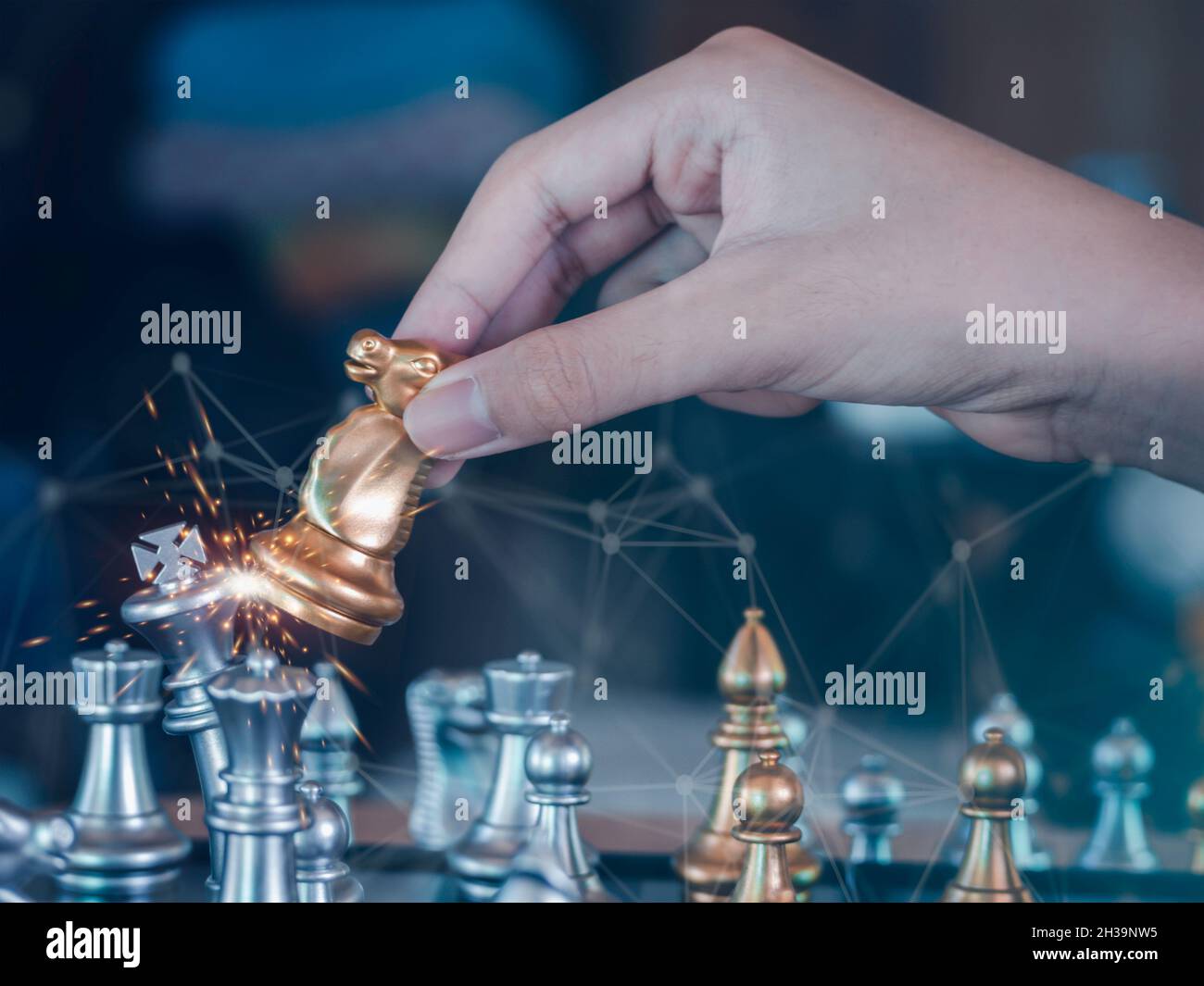 Hand moving chess piece on board hi-res stock photography and images ...