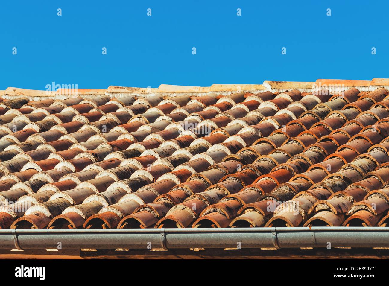 Old mediterranean style roof tiles as background Stock Photo - Alamy