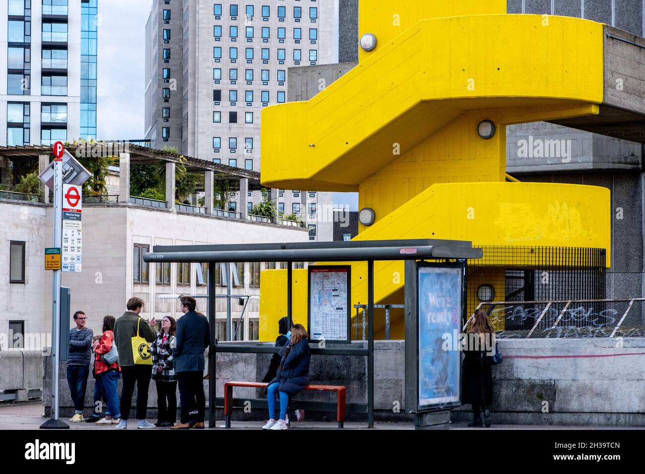 People Queuing And Waiting At A bus Stop Or Bus Shelter On Waterloo ...