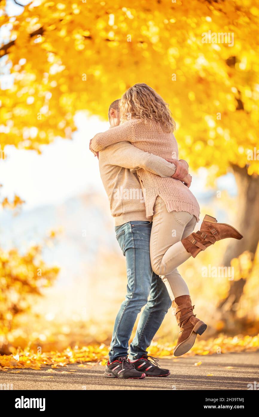 Holds in his arms hi-res stock photography and images - Alamy