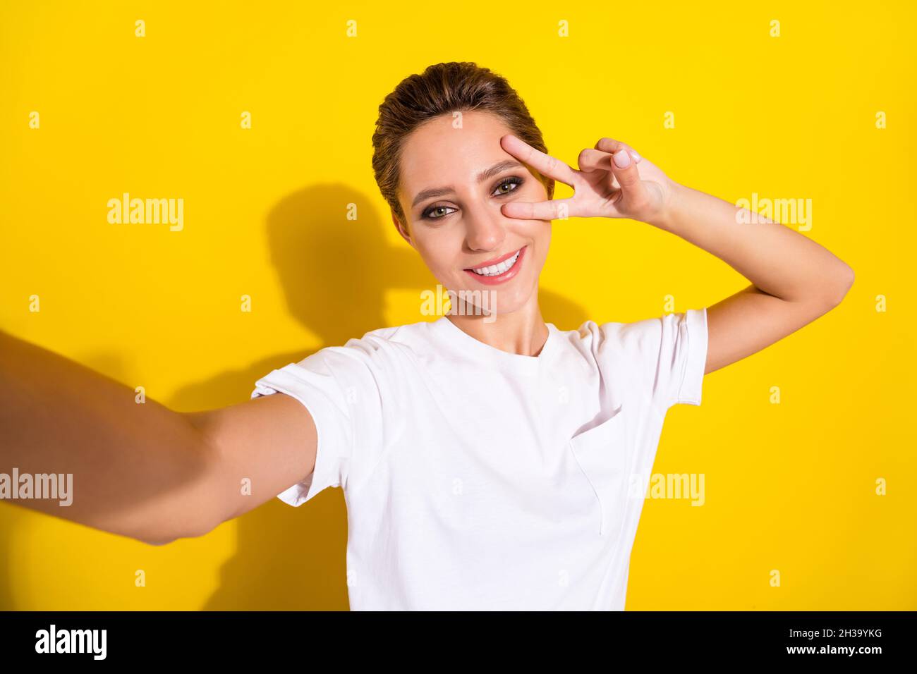 Photo of nice brown short hairdo young lady do selfie show v-sign wear ...