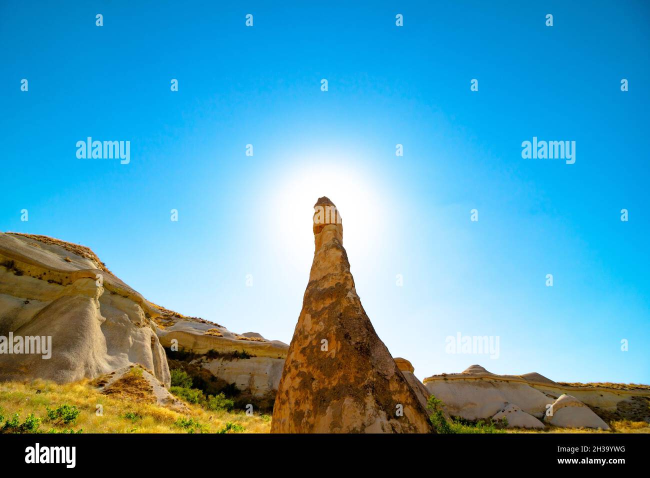 Fairy Chimneys or Peri Bacalari wtih sun on the background in Pasabagi ...