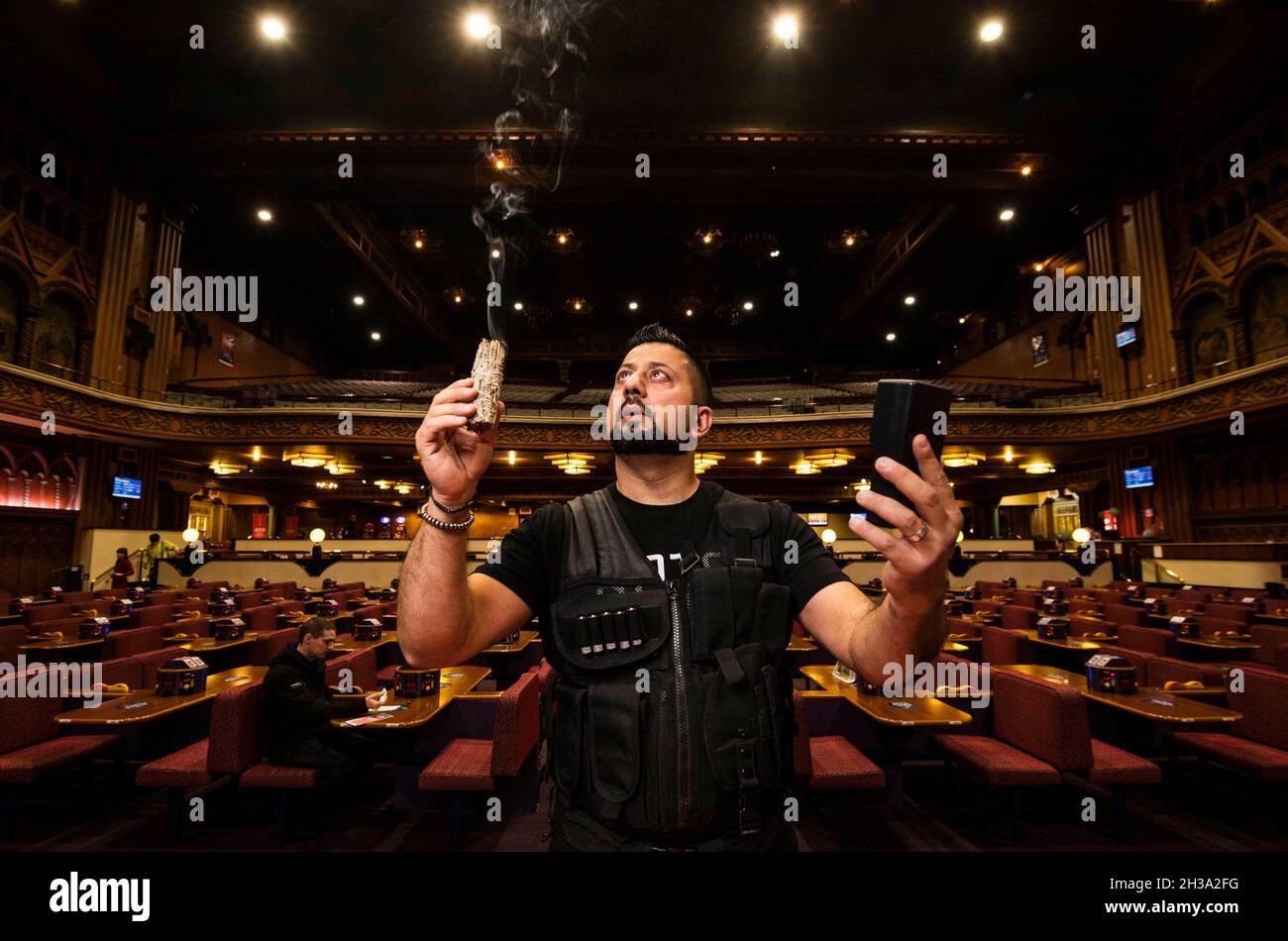 EDITORIAL USE ONLY Ghost Hunter Barri Ghai conducts a paranormal ...