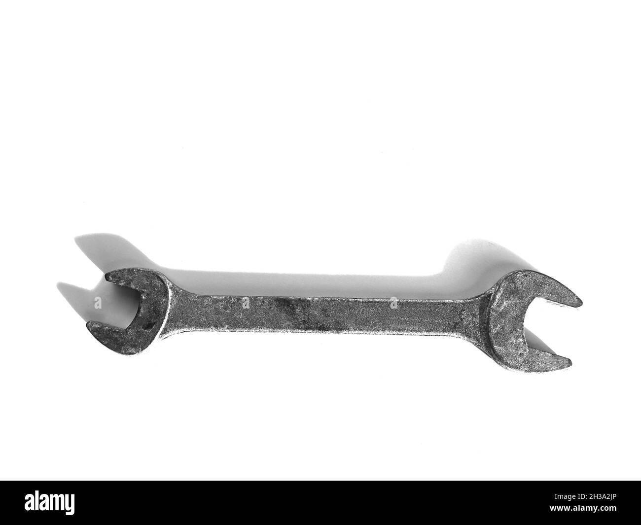 Old spanner with its shadow isolated on white background Stock Photo ...