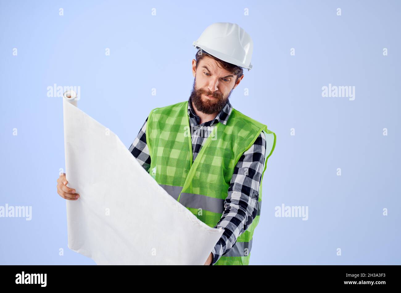 engineer with documents and drawings blueprints isolated background ...