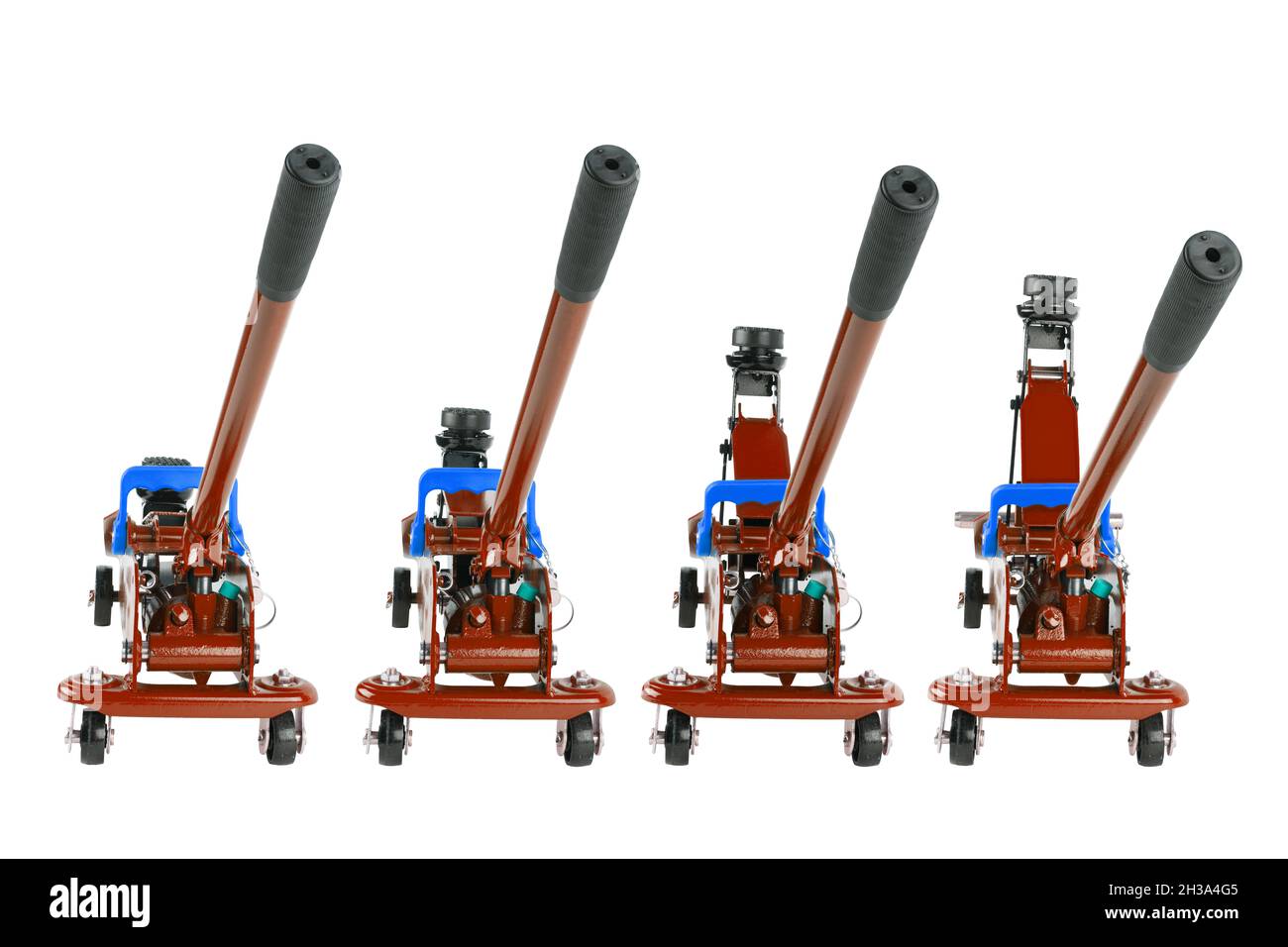 set of red isolated hydraulic car jacks on white background raised in ...