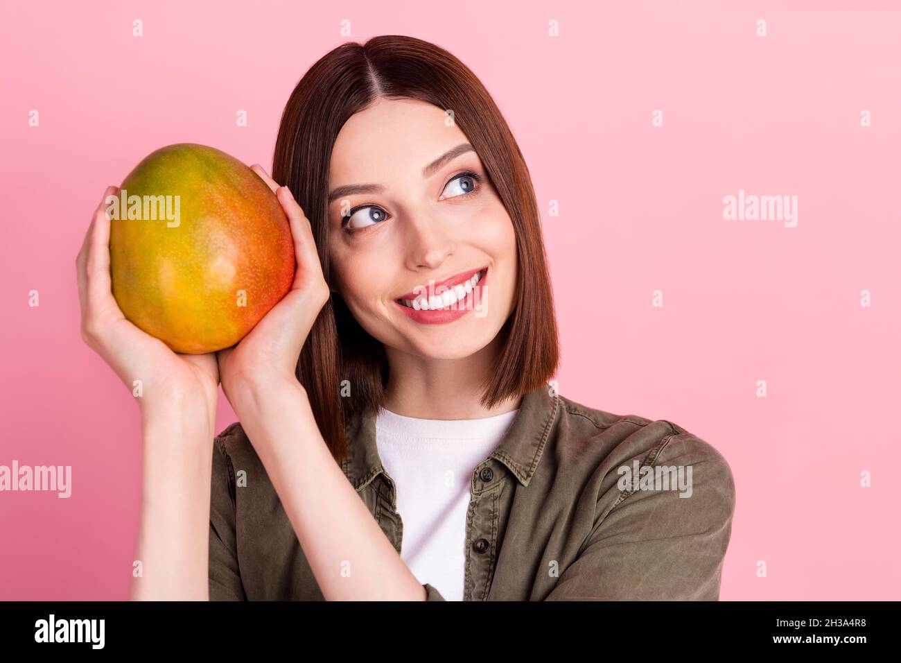 Photo Of Nice Brunette Hairdo Millennial Lady Hold Mango Look Empty