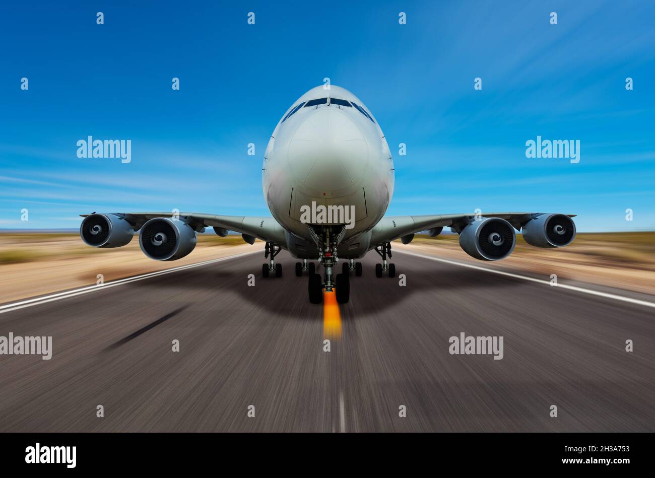 Big airplane on the runway motion front view Stock Photo - Alamy