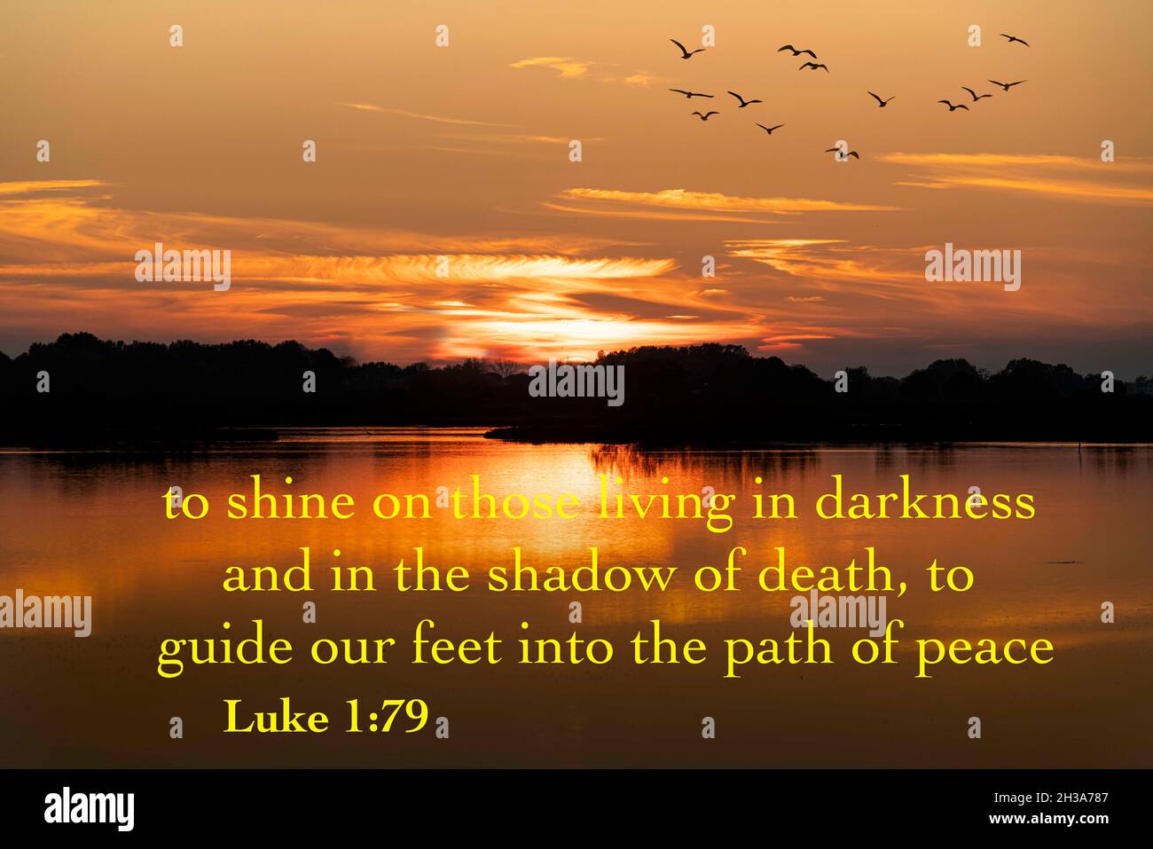 The Bible verse with the light of the setting sun on the lagoon Stock ...