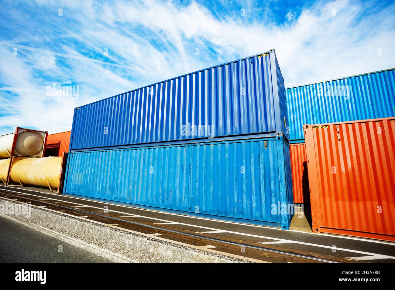 Containers of different types in the port Stock Photo - Alamy