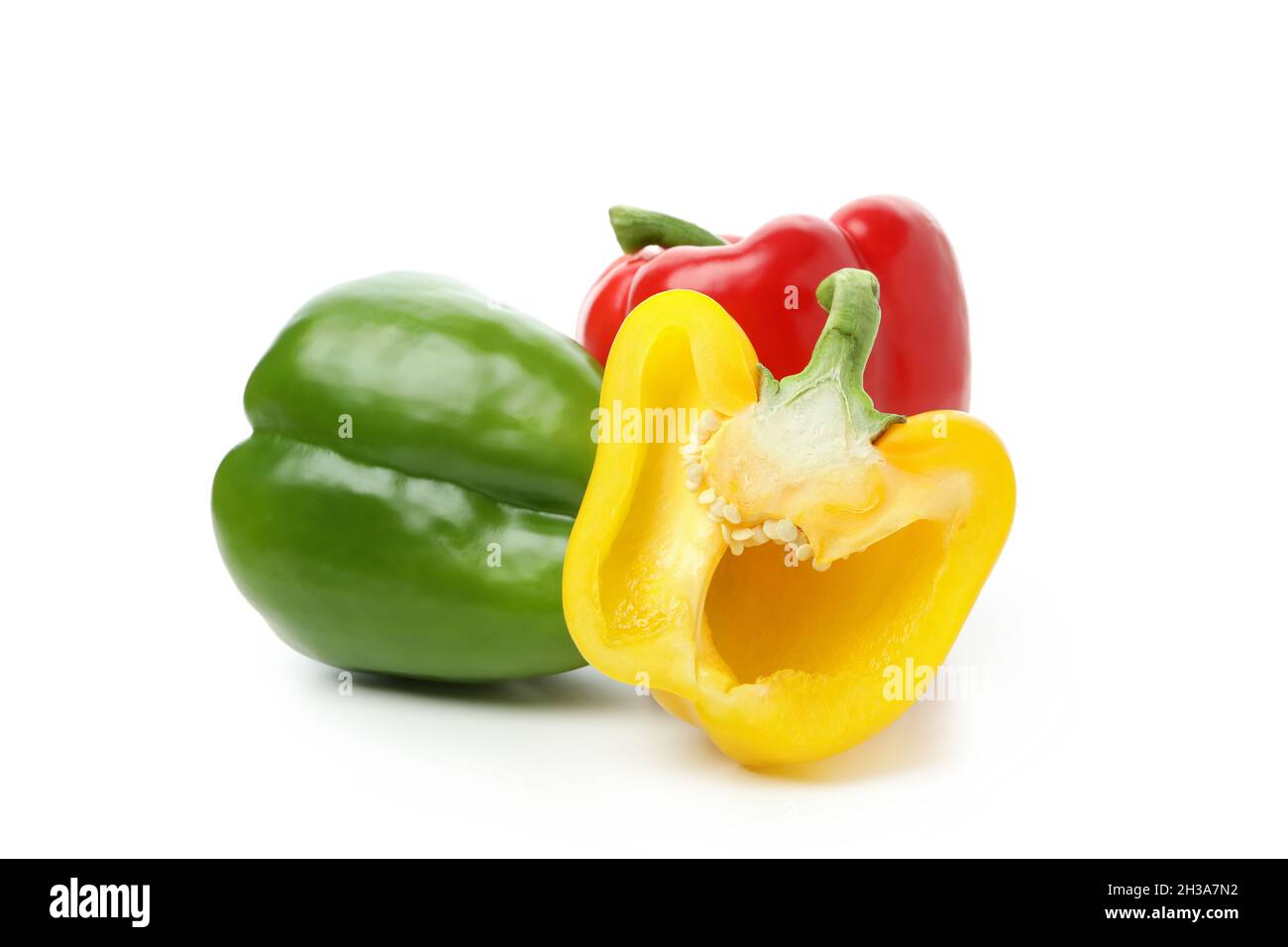 Multi-colored bell pepper isolated on white background Stock Photo - Alamy