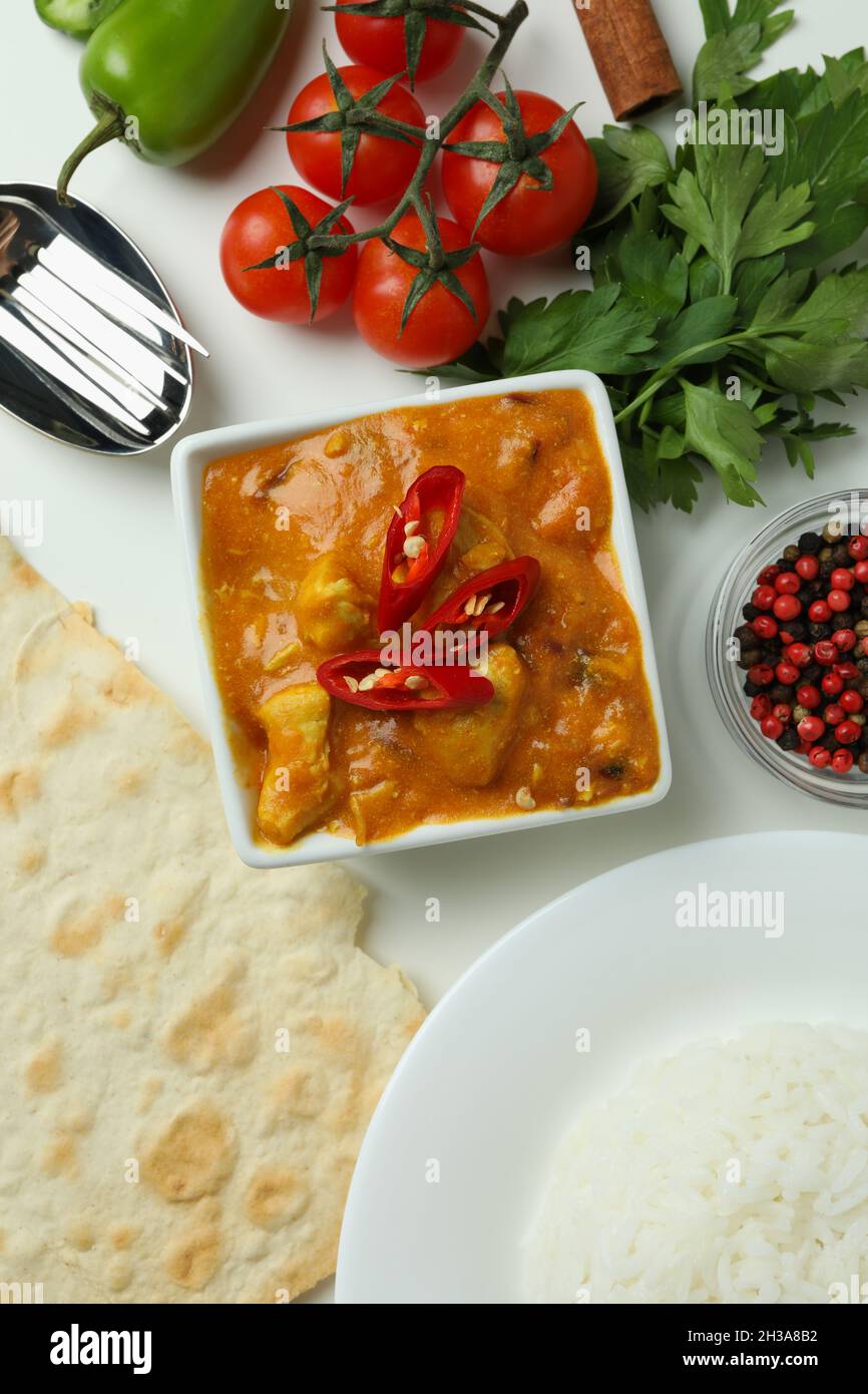 Concept of tasty food with chicken tikka on white background Stock ...