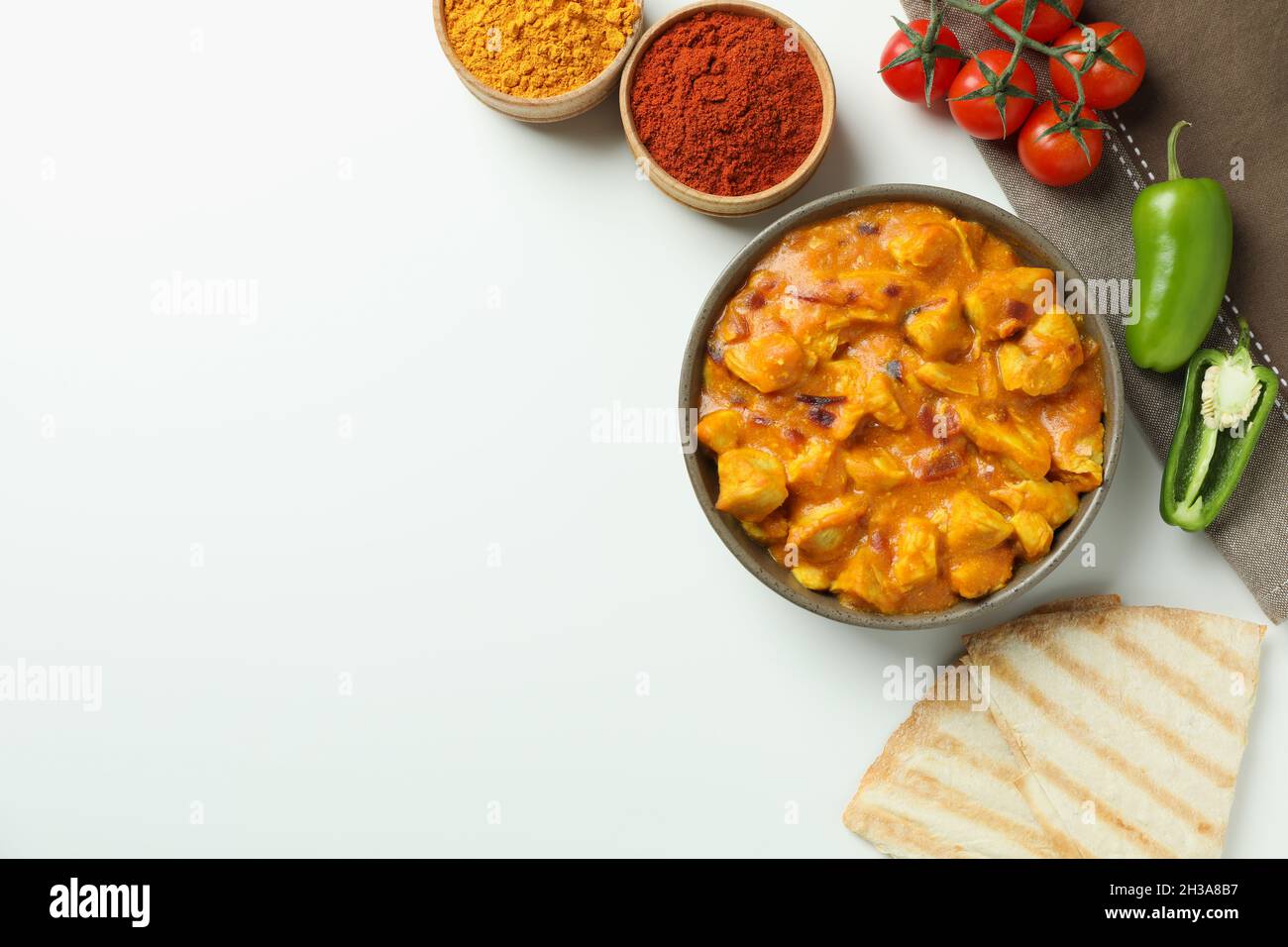 Concept of tasty food with chicken tikka on white background Stock ...