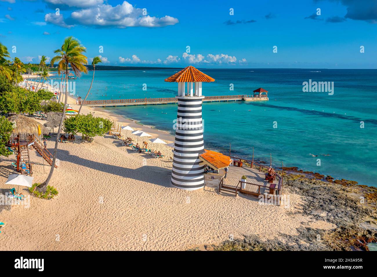 Aerial view of a striped lighthouse at a beach Stock Photo - Alamy