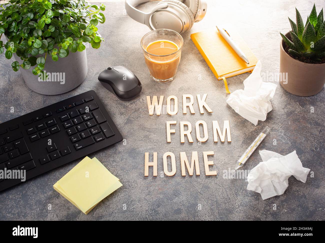 work from home text desk with keyboard computer smartphone notebook ...