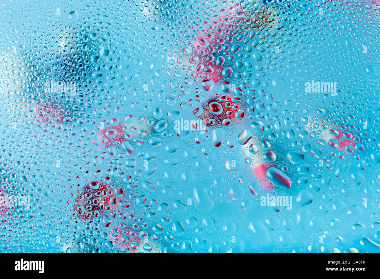 pill tablet capsule medicine through water drops background Stock Photo ...